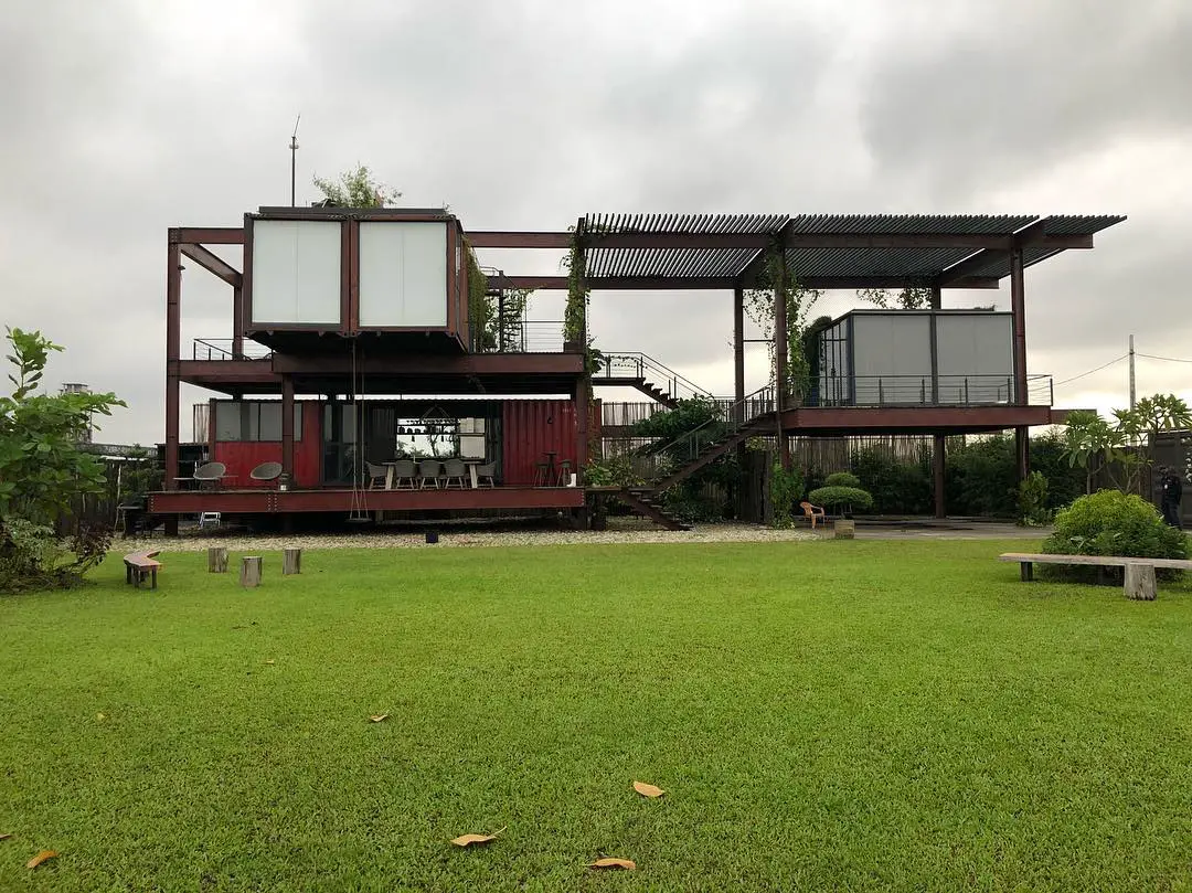Breezy Shipping Container House is Wealthy in Glass and Greenery ...
