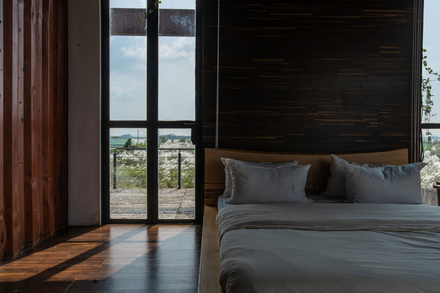 Breezy Shipping Container House is Wealthy in Glass and Greenery ...