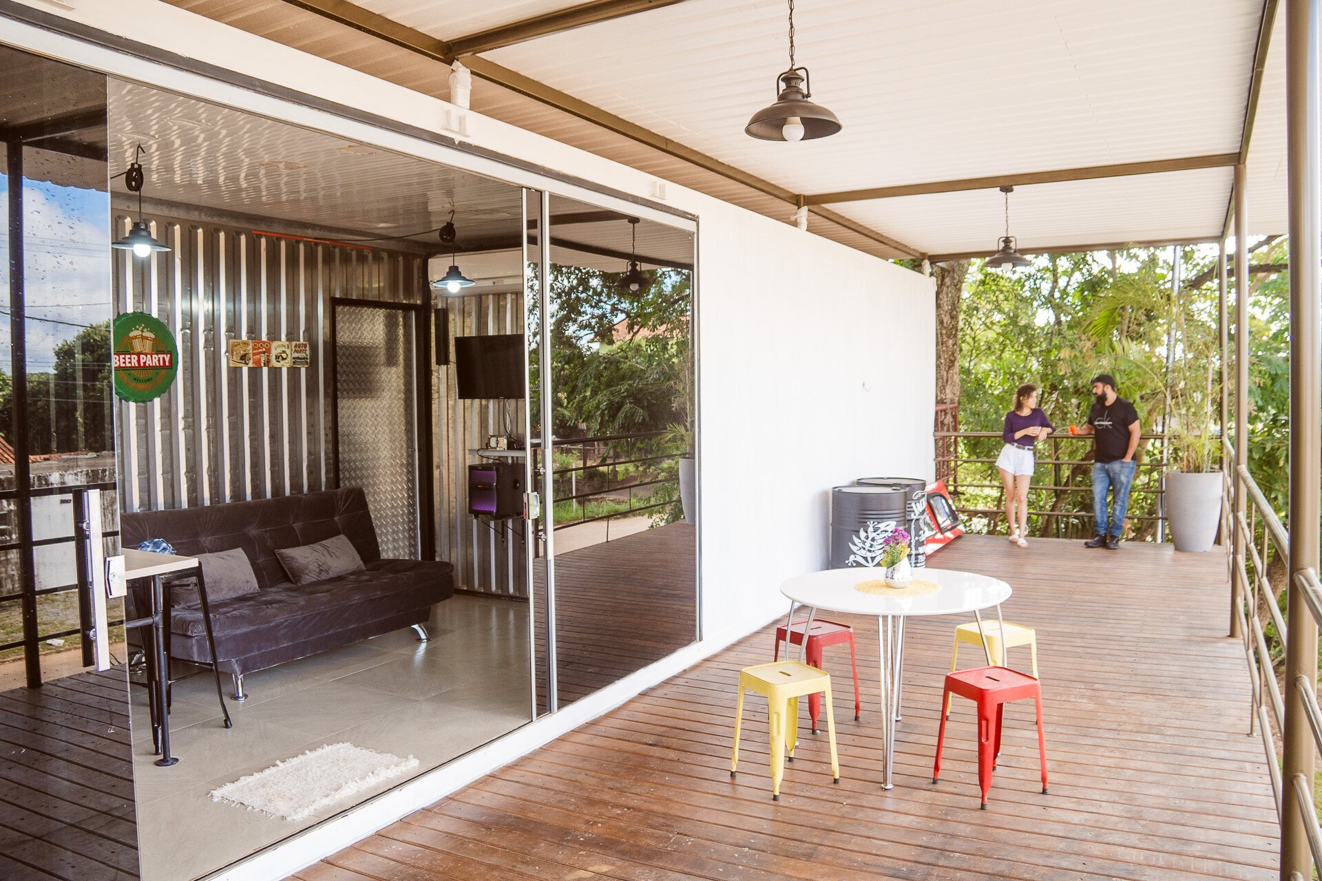 A Container House Under Tree Branches - Brazil