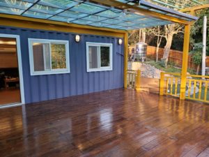 L-Shaped Container House with Amazing Veranda