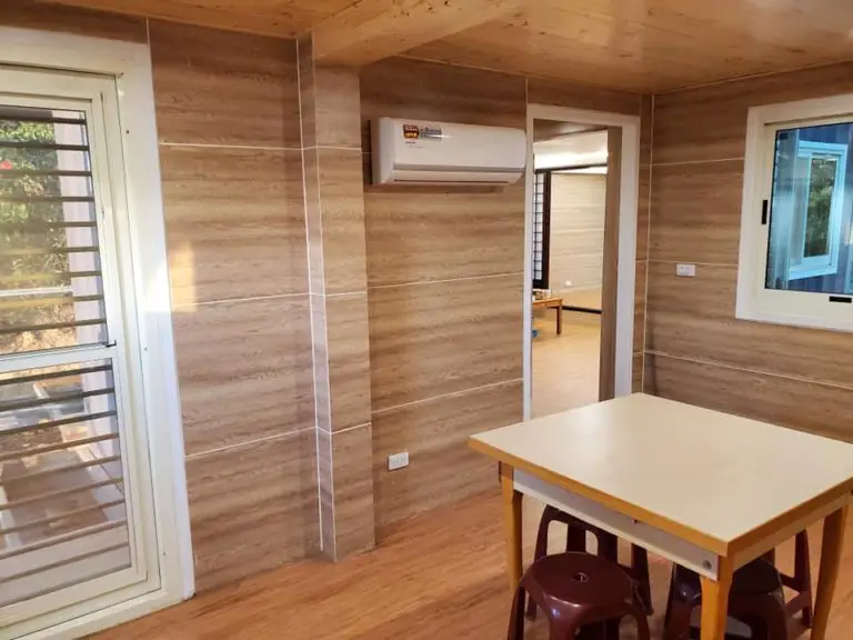 L-Shaped Container House with Amazing Veranda