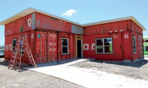 Red Painted Shipping Container House from San Antonio