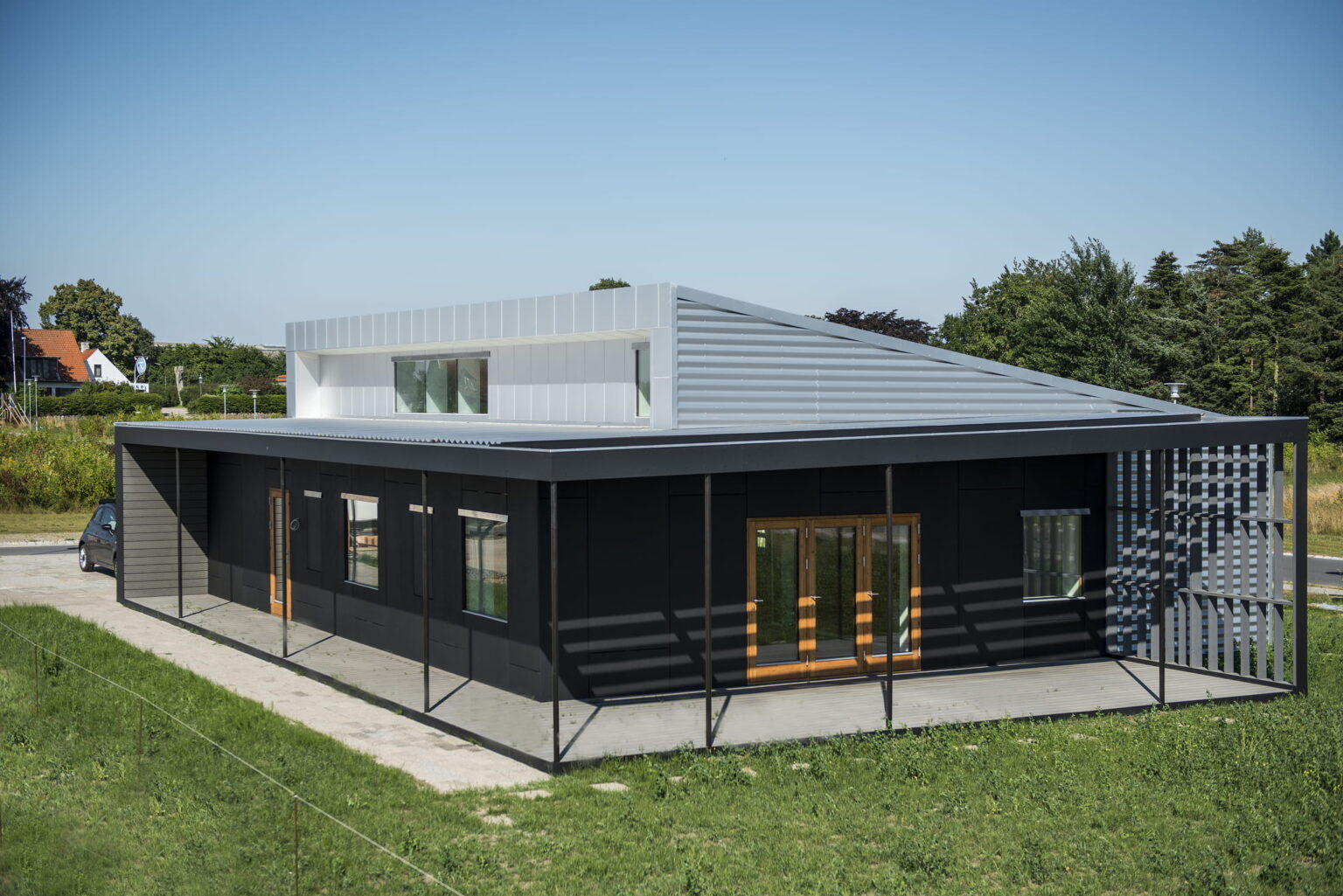 Shipping Container House Built from Processed Recycled Materials in Denmark