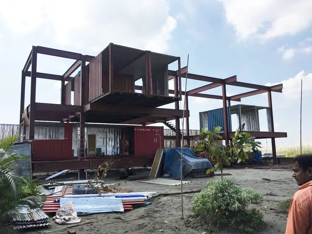 Breezy Shipping Container House is Wealthy in Glass and Greenery ...