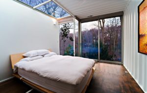 Shipping Container Home in Center of Trees