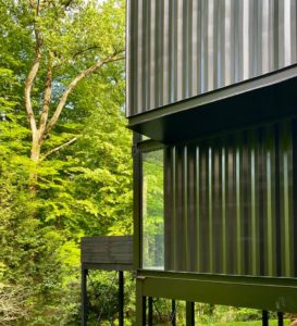 Shipping Container Home in Center of Trees