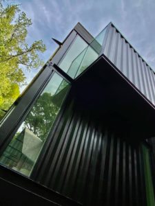 Shipping Container Home in Center of Trees