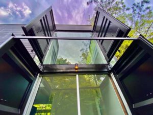 Shipping Container Home in Center of Trees