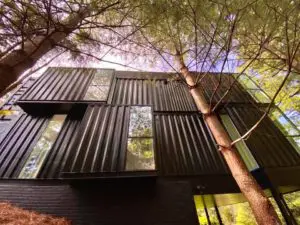 Shipping Container Home in Center of Trees