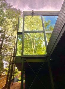 Shipping Container Home in Center of Trees