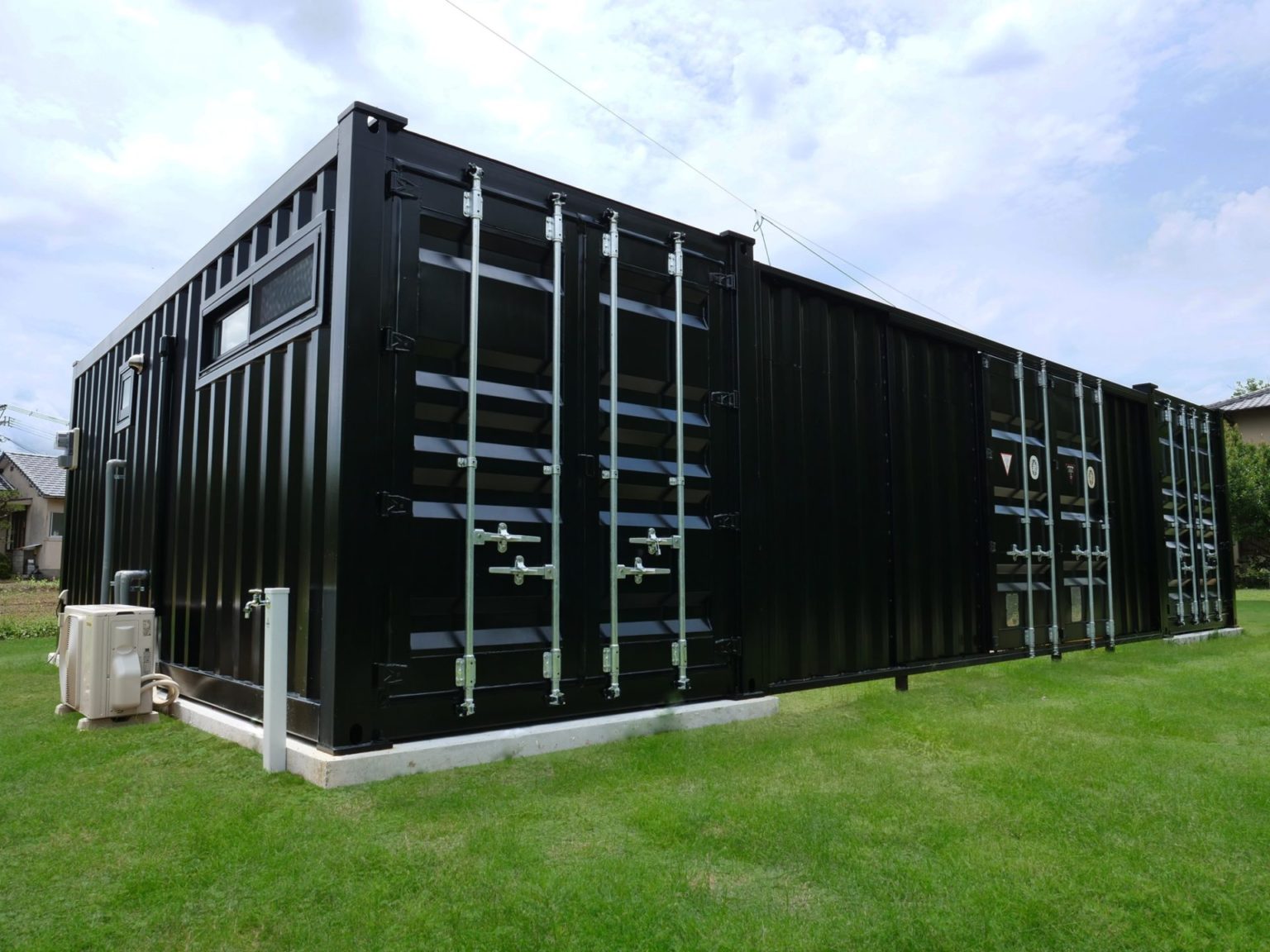 Cool Looking Black Container House | Living in a Container