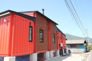 6 Shipping Containers Turned Into a Red House