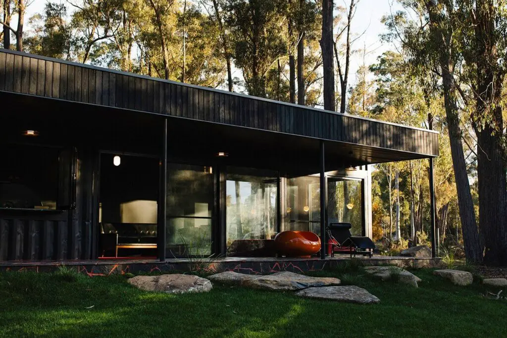 40ft Shipping Container Turned Into a Dark Themed Home