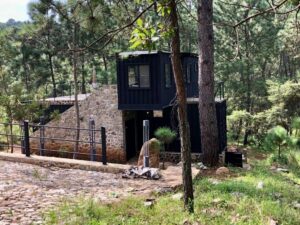 Container Living: A Three-Story Castle-Like Design