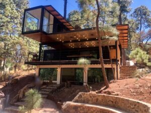 Container Living: A Three-Story Castle-Like Design